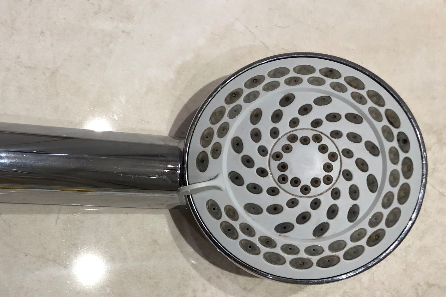 How to Clean a Shower Head With Lemon Juice - Sparkling Penny
